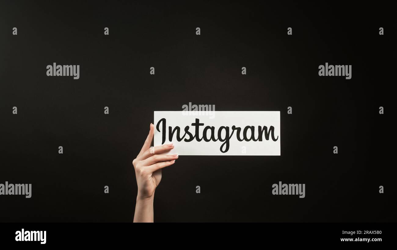Instagram sign follow social network hand app logo Stock Photo - Alamy