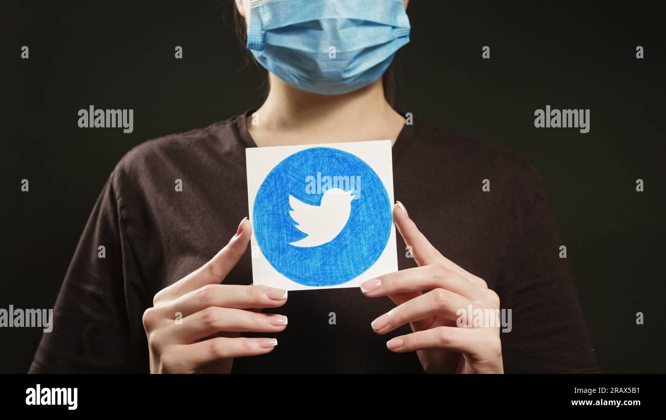 Covid social network woman face mask twitter icon Stock Photo - Alamy