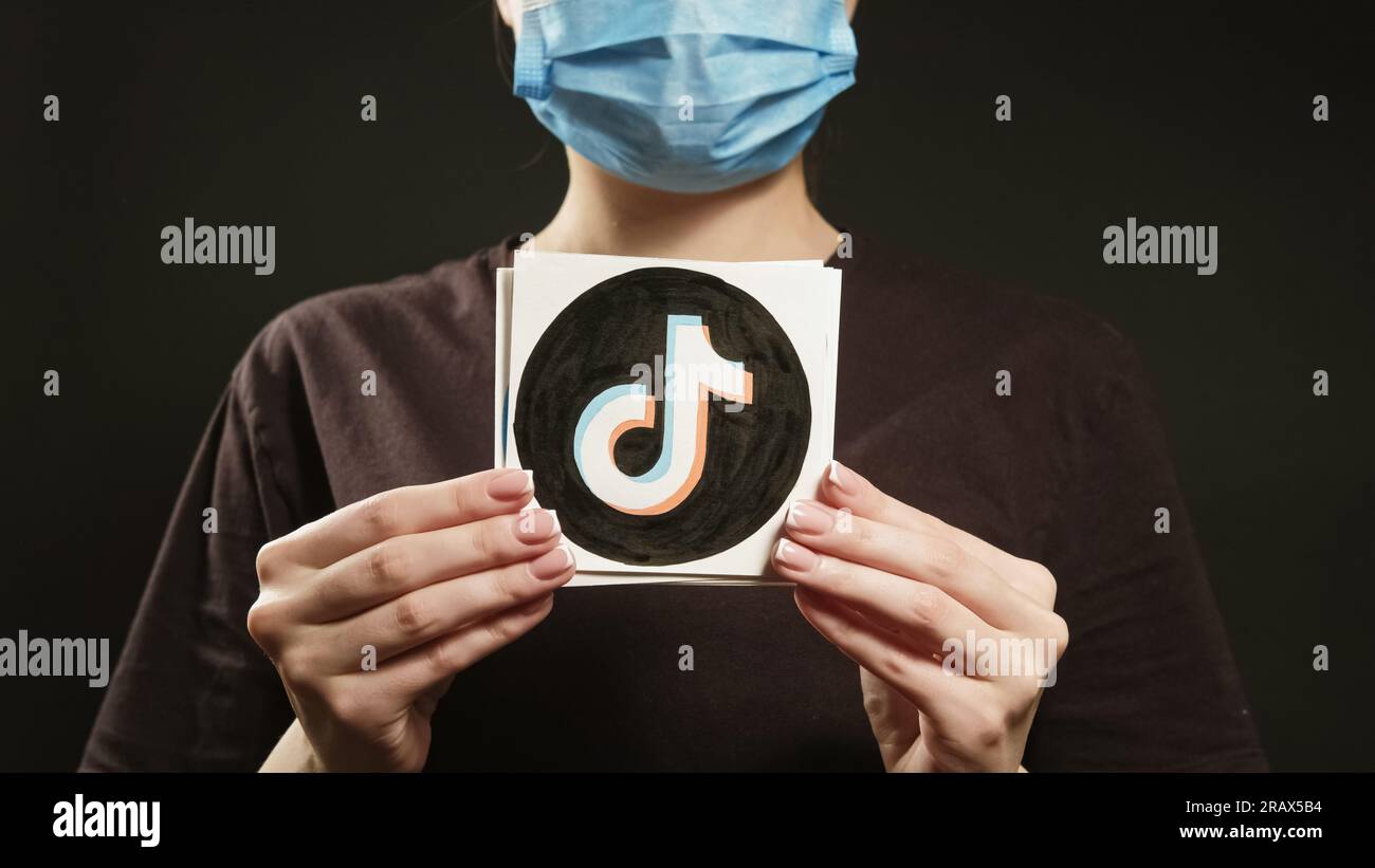 Social network quarantine woman mask tiktok logo Stock Photo - Alamy