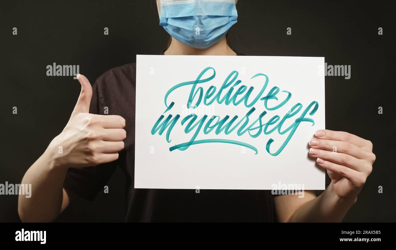 Believe in yourself recovery motivation woman mask Stock Photo - Alamy