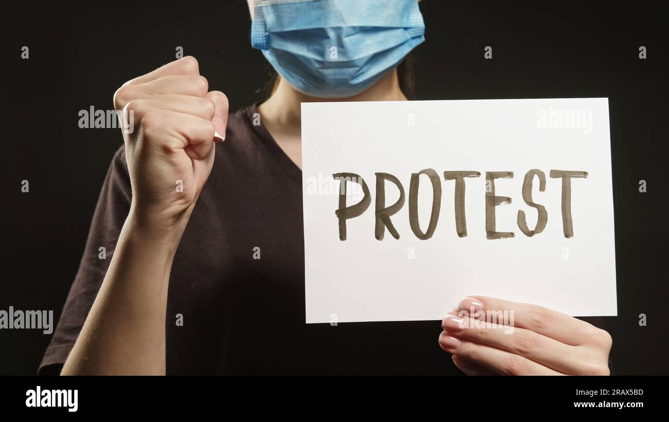 Ecology protest air pollution activist mask sign Stock Photo - Alamy