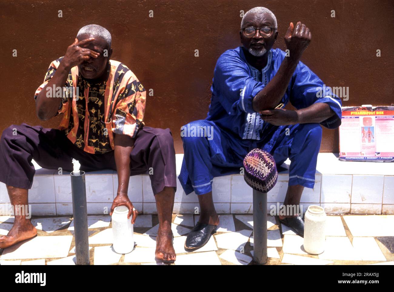 Muslims perform wudu before prayers at the Central Mosque in Accra ...