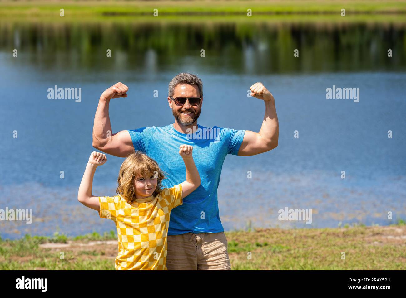 strong family relationship of father and son. fatherhood support ...