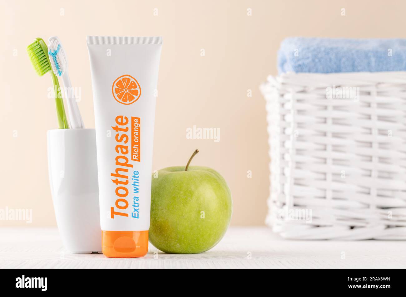 A clean and refreshing image featuring toothpaste and toothbrushes ...