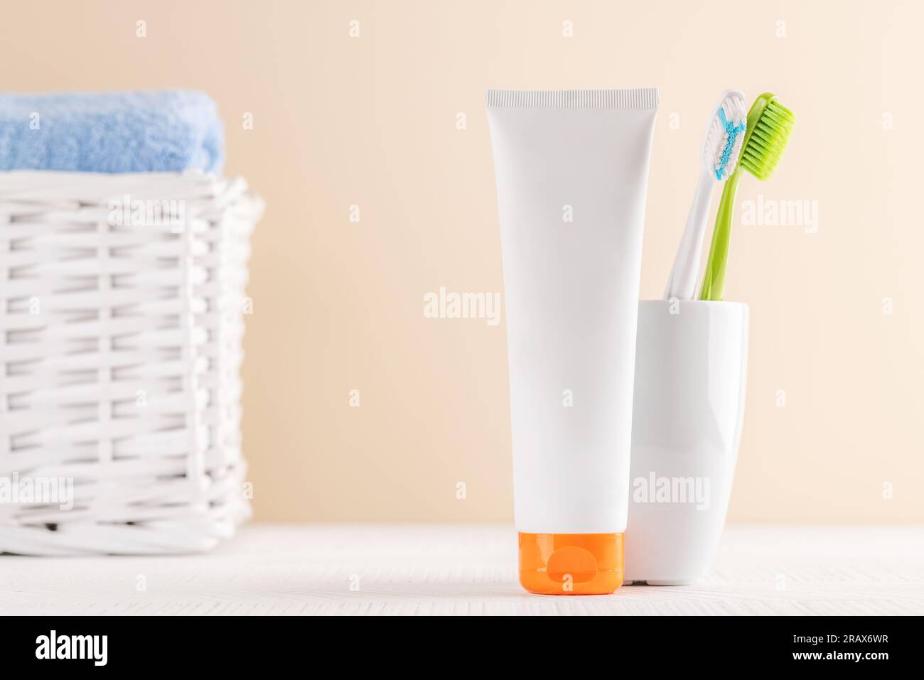A clean and refreshing image featuring toothpaste and toothbrushes ...