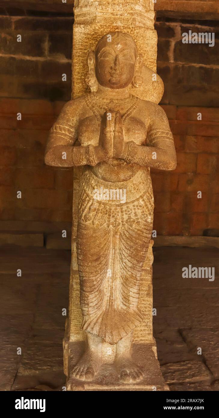 Sculpture of woman with Namaste pose in the Temple of Arulmigu ...