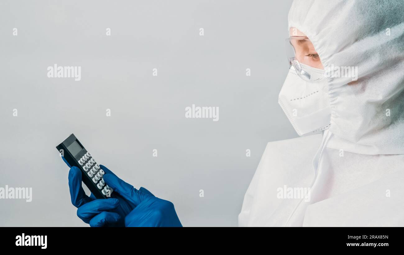 Medical calculations nurse woman counting cases Stock Photo - Alamy