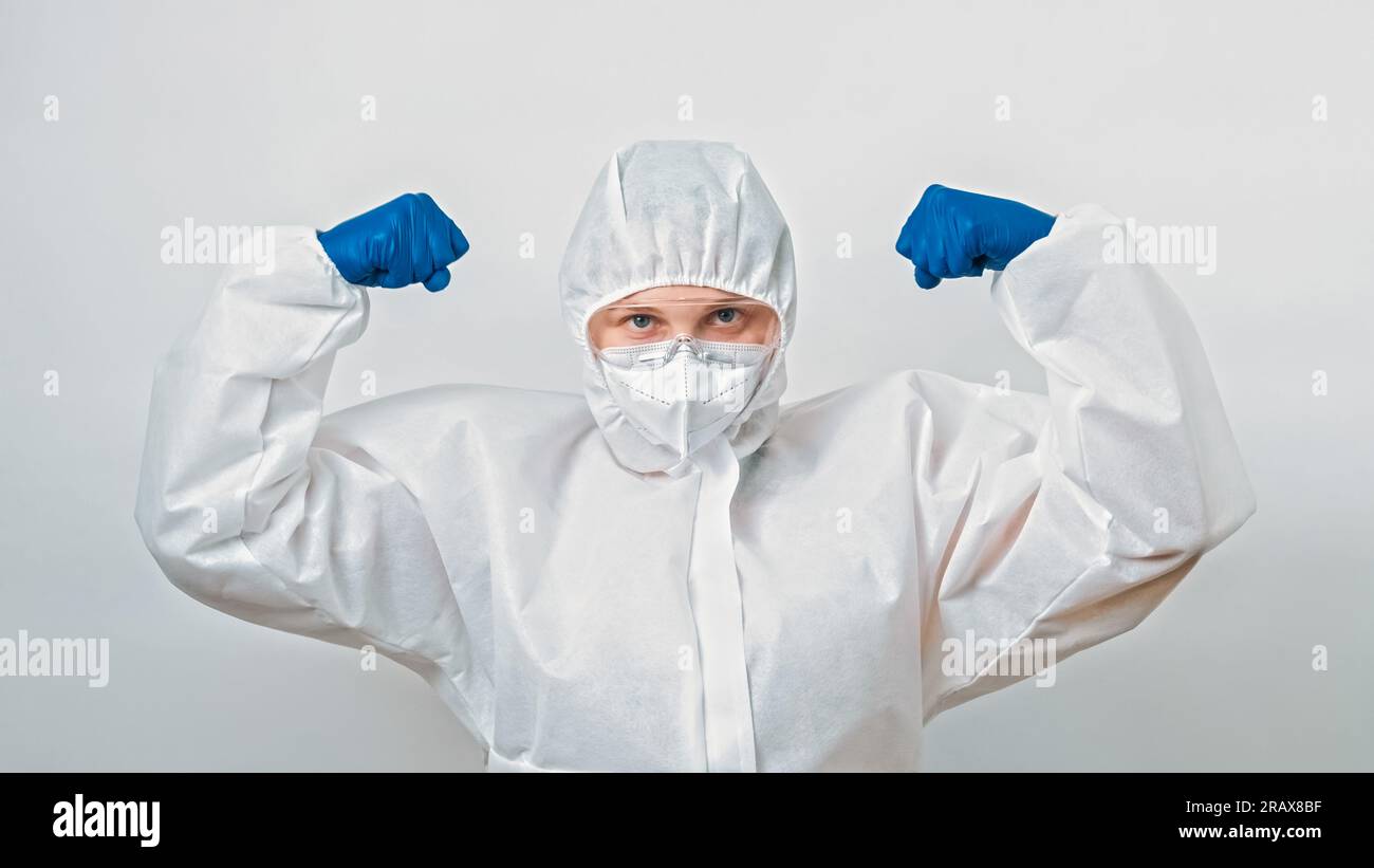 Brave doctor fight woman protective suit strength Stock Photo - Alamy