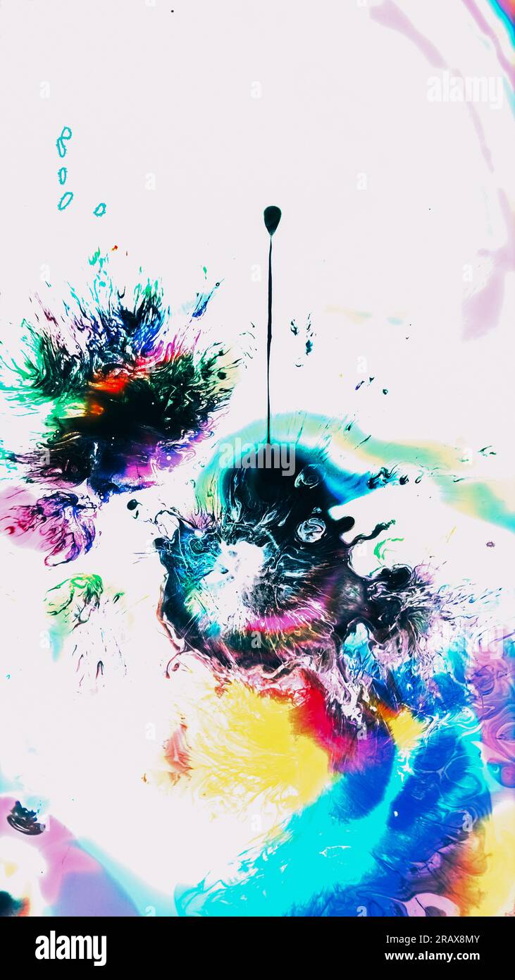Color dropping acrylic swirl ink splash fluid mix Stock Photo - Alamy