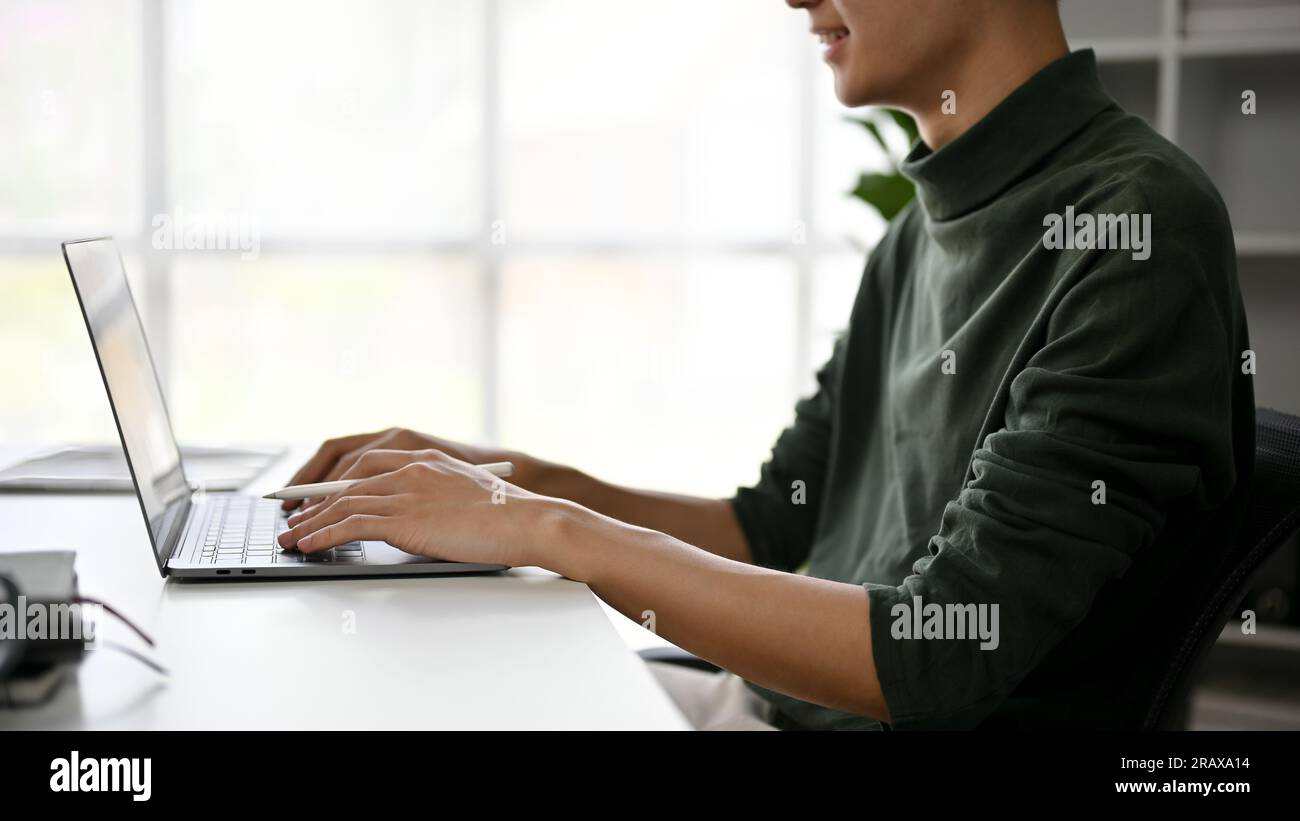 Close-up rear view image of a handsome and smart young Asian man in ...