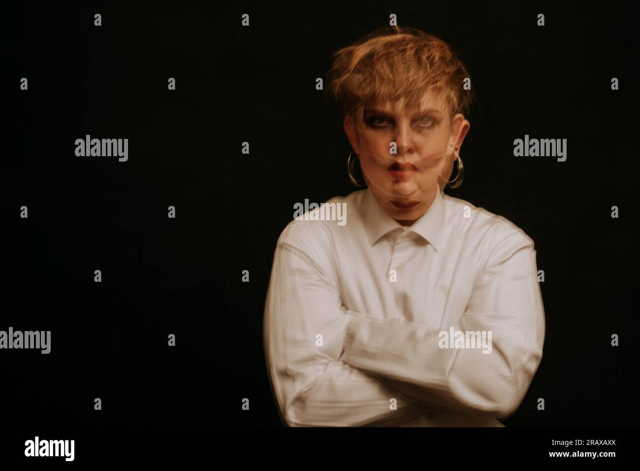 psychopath with mental disorders and insanity on a dark background. A ...