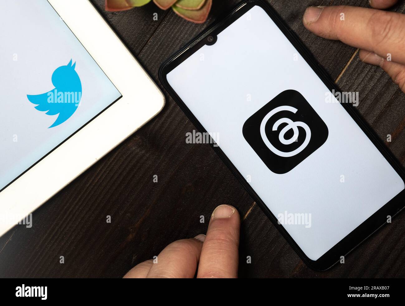 Carrara, Italy - July 6, 2023 - Thread app logo and twitter logo on a ...