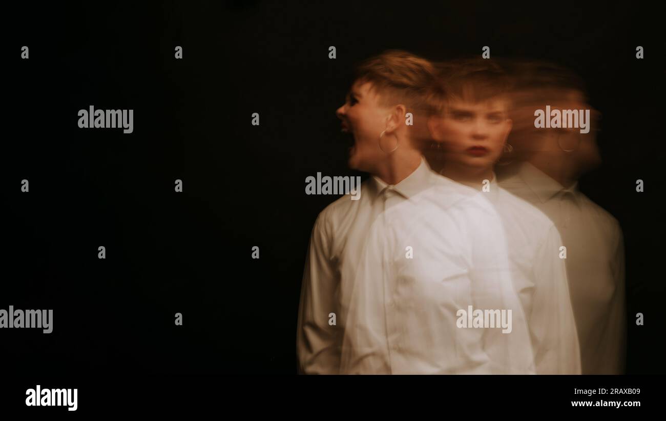 psychopath with mental disorders and insanity on a dark background. A ...