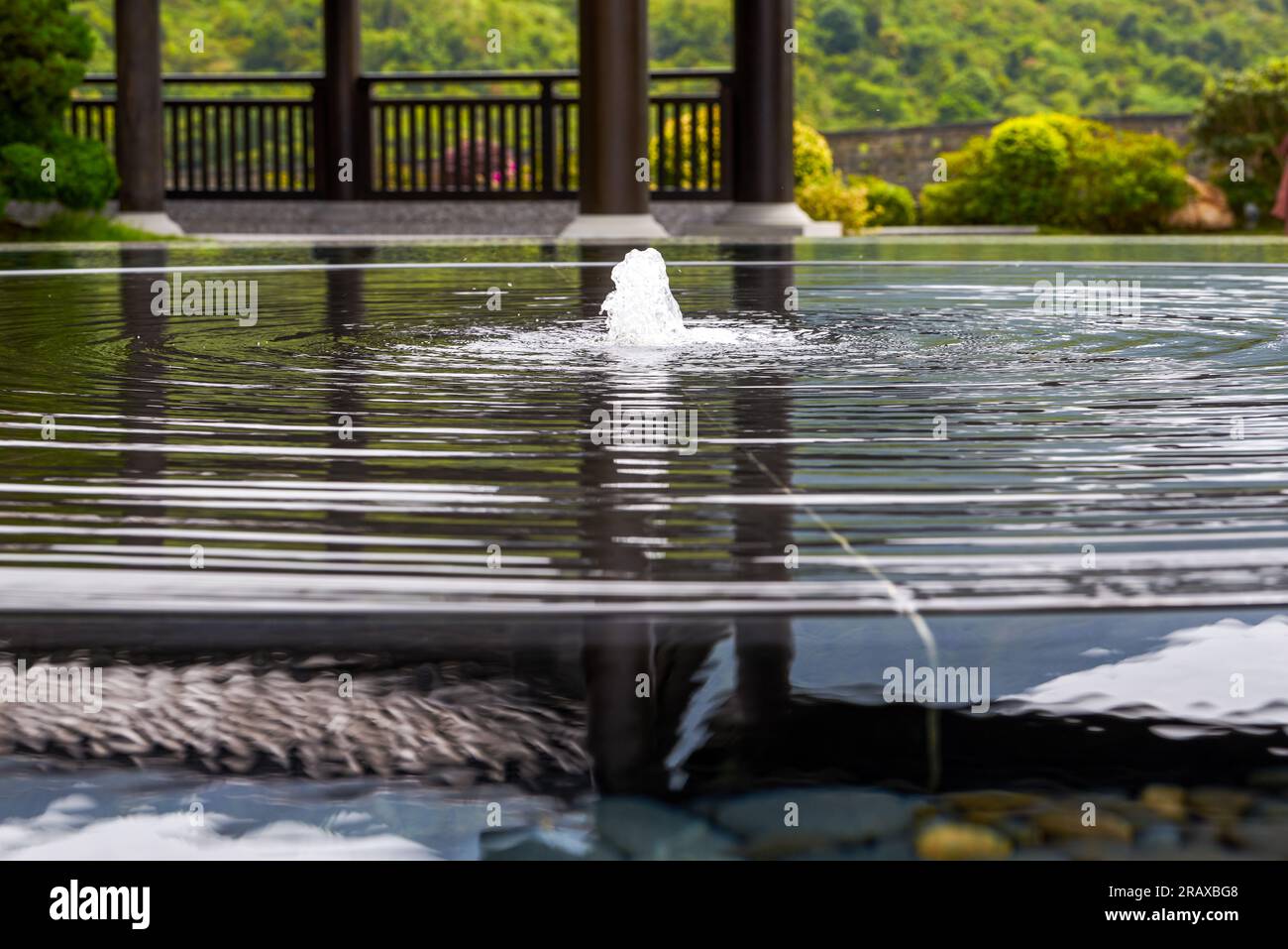 Water supply fountain in Japanese Buddhist garden at Tsz Shan Monastery ...