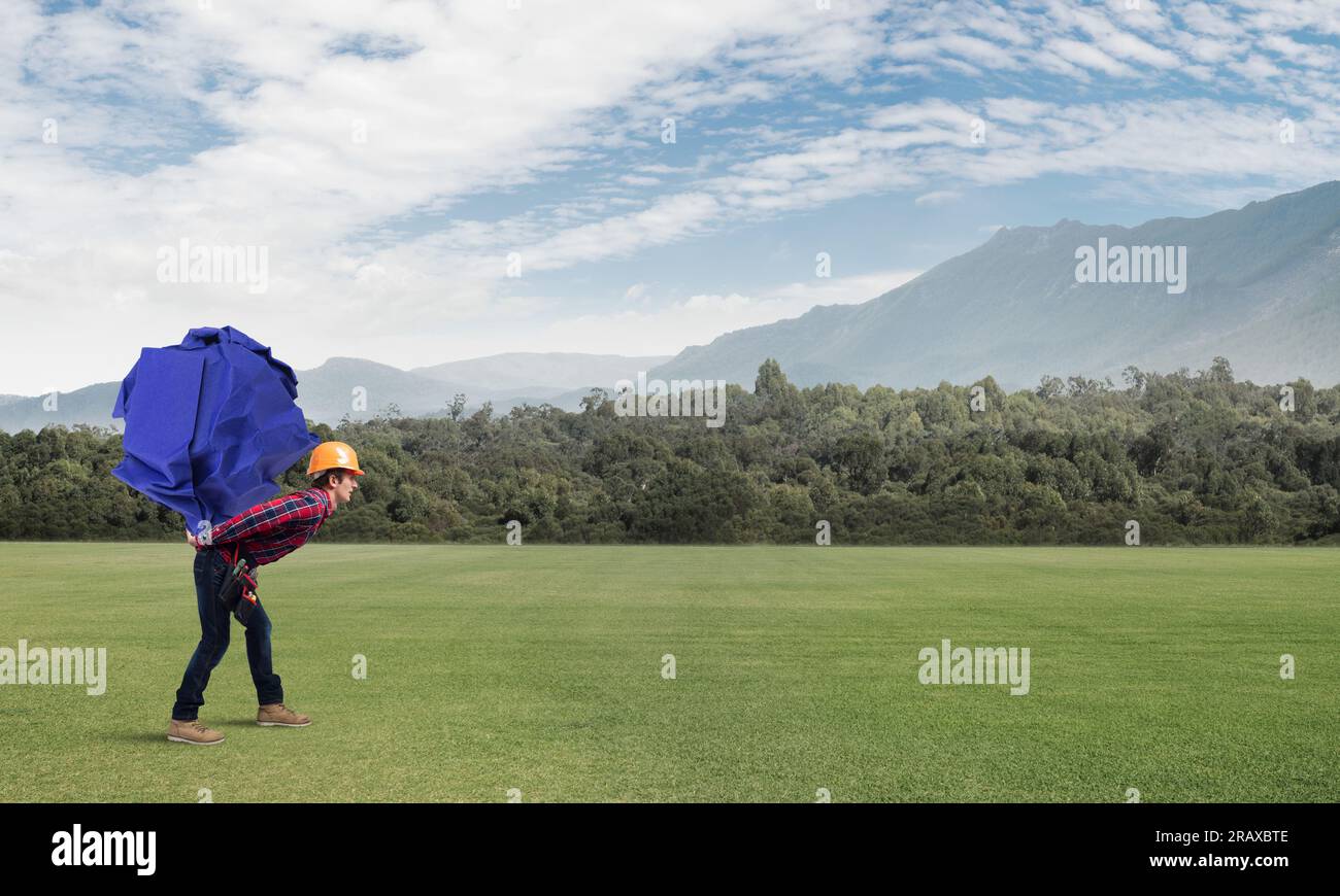 Engineer man carry load Stock Photo - Alamy