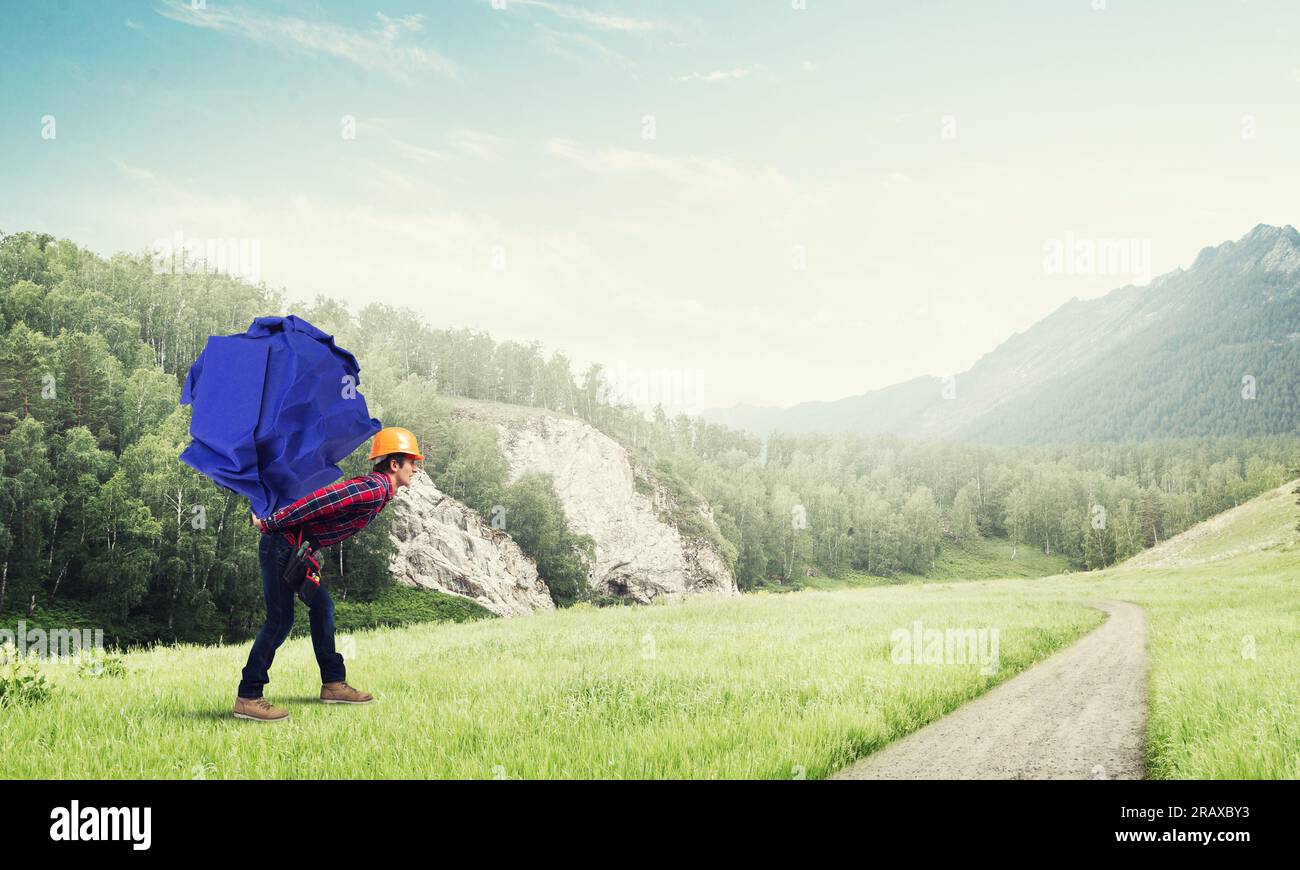 Engineer man carry load Stock Photo - Alamy