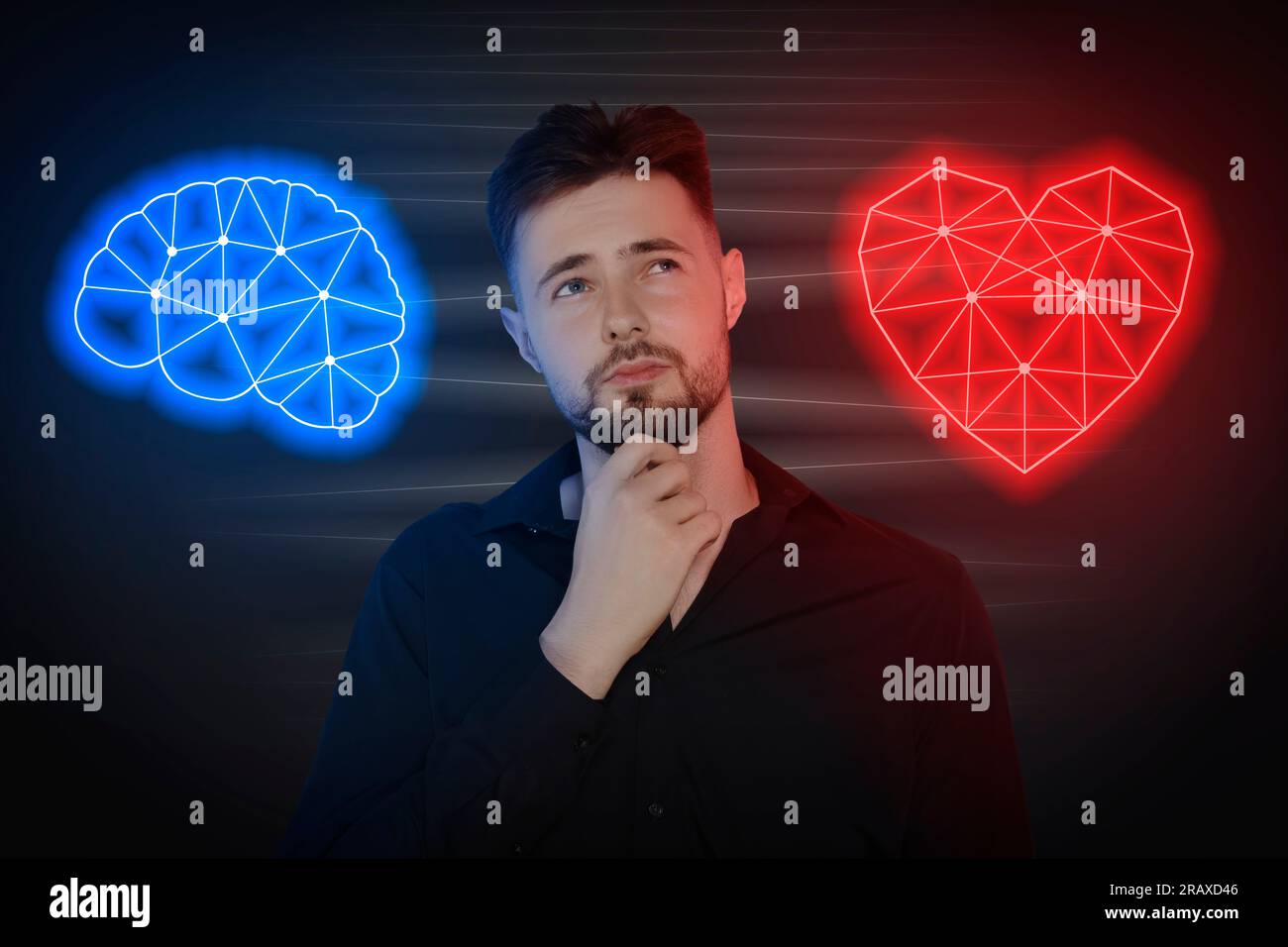 Choosing between logic and emotions. Thoughtful man between glowing ...