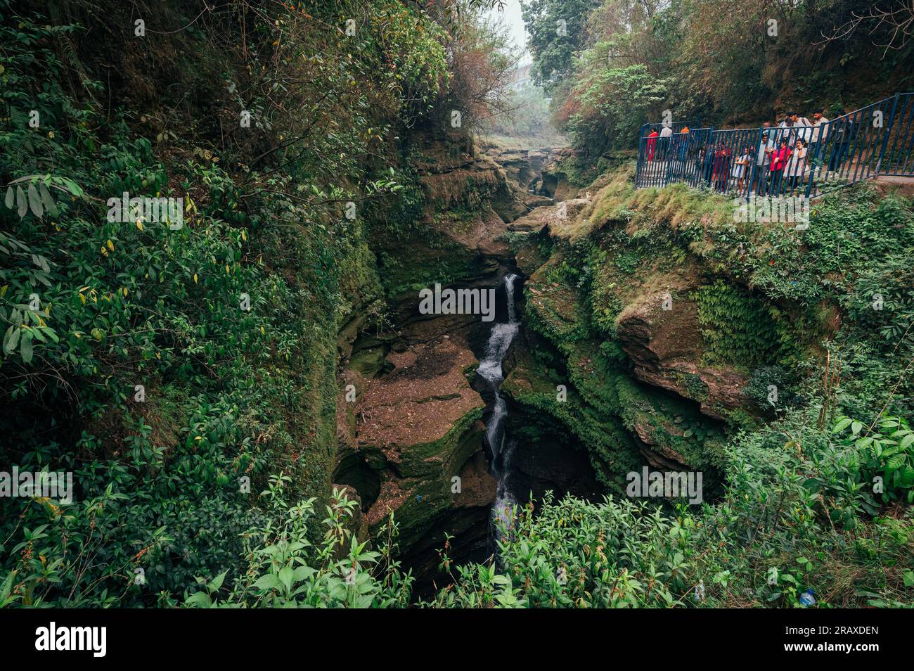 A landscape of Devi's Falls, a waterfall located at Pokhara in Kaski ...