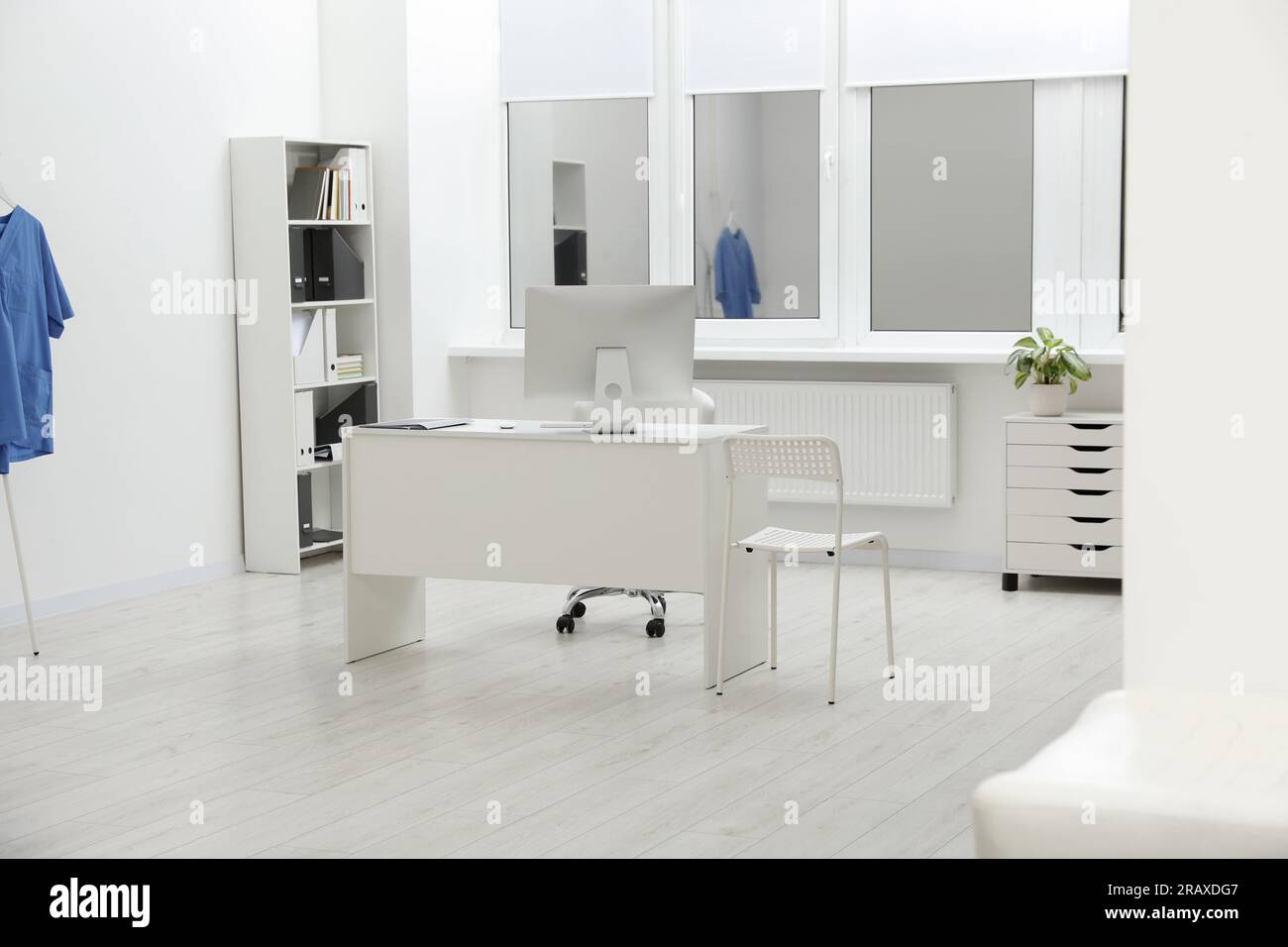 Stylish medical office interior with doctor's workplace Stock Photo - Alamy
