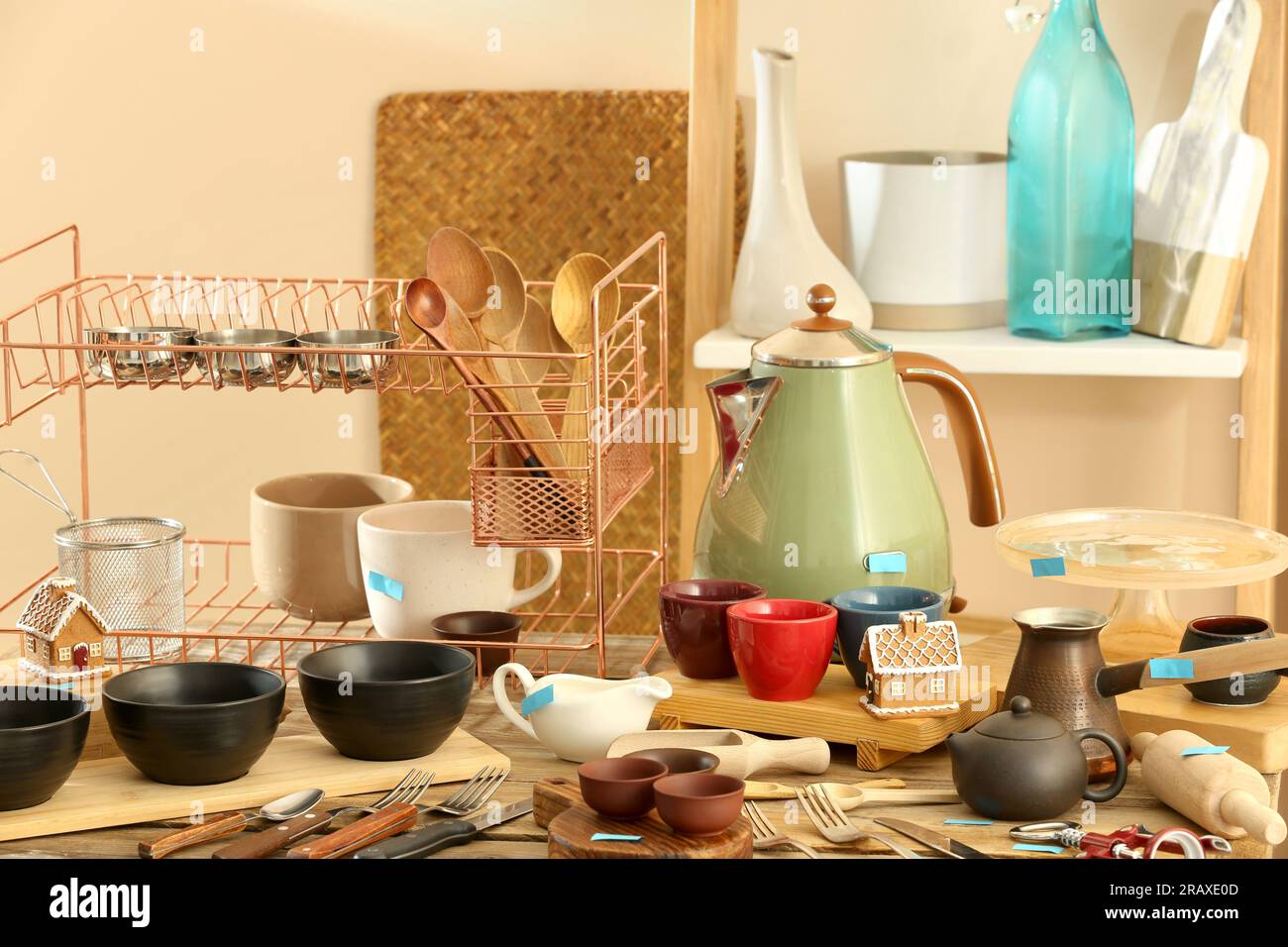 Many different cooking utensils in room. Garage sale Stock Photo - Alamy