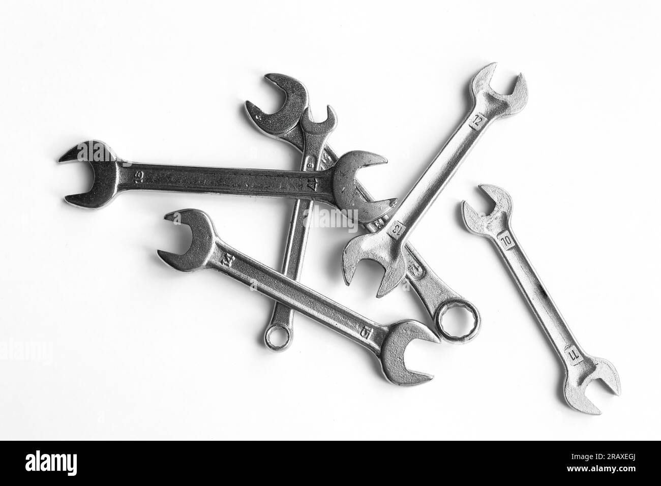 some wrenches isolated on a white background Stock Photo - Alamy
