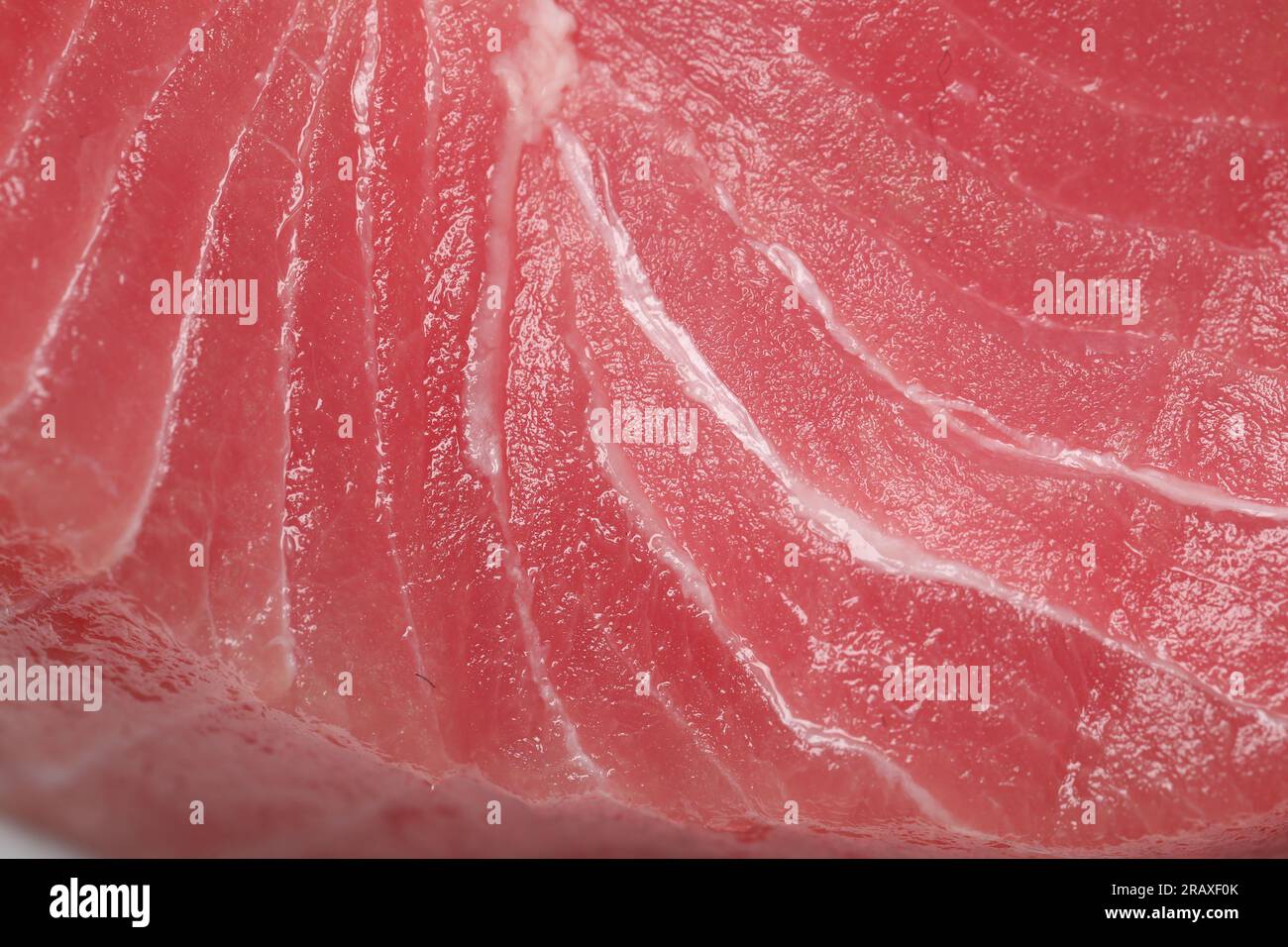 Texture of raw tuna fillet as background, closeup Stock Photo - Alamy
