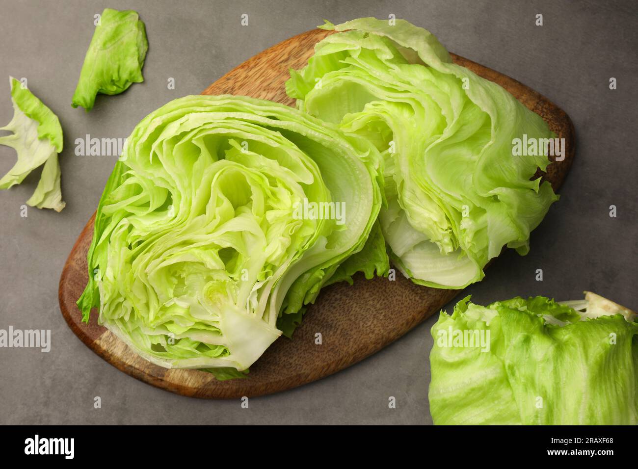 Flat lay composition with fresh green cut and whole iceberg lettuce ...