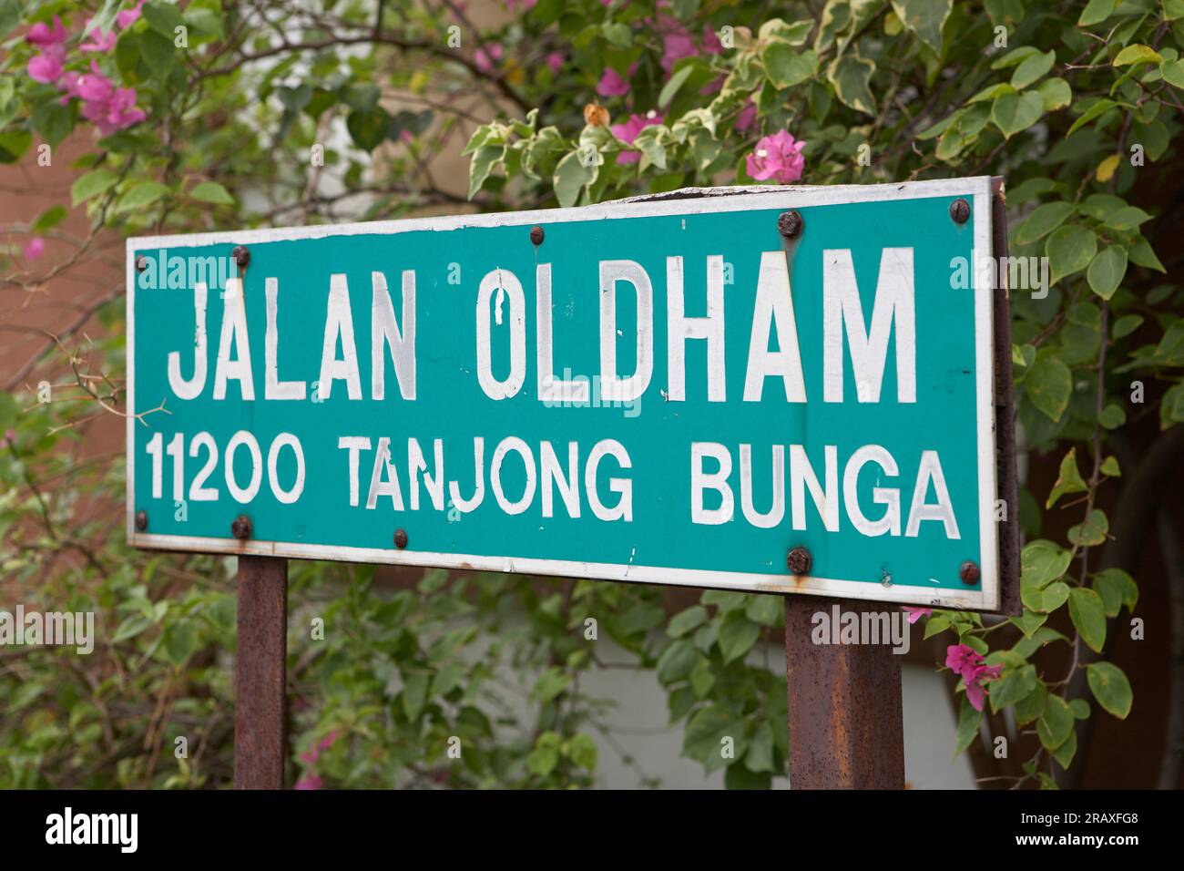 An old sign for Jalan Oldham on Penang Island, Malaysia Stock Photo - Alamy