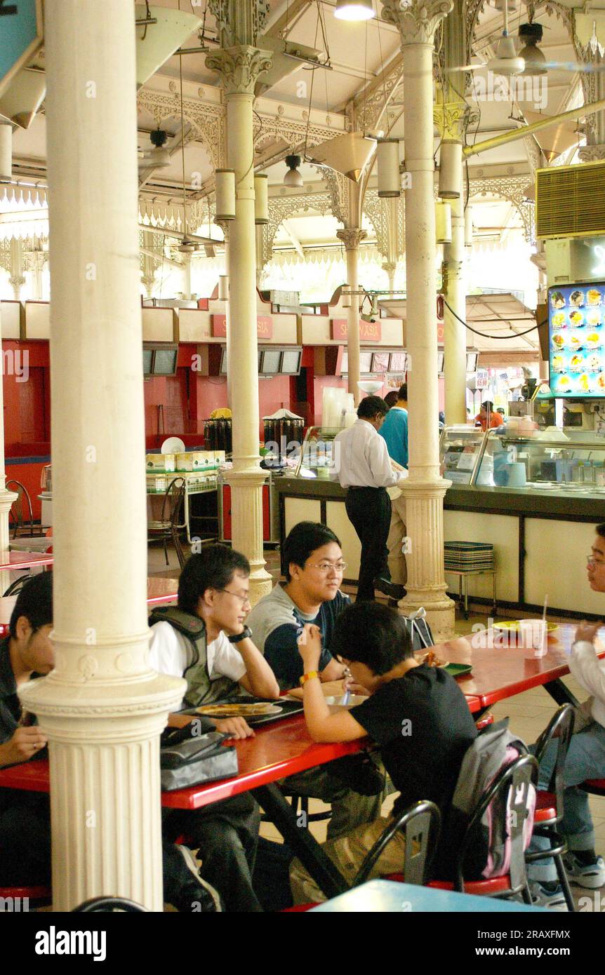 Young people eating in a food hall in Singapore Stock Photo - Alamy
