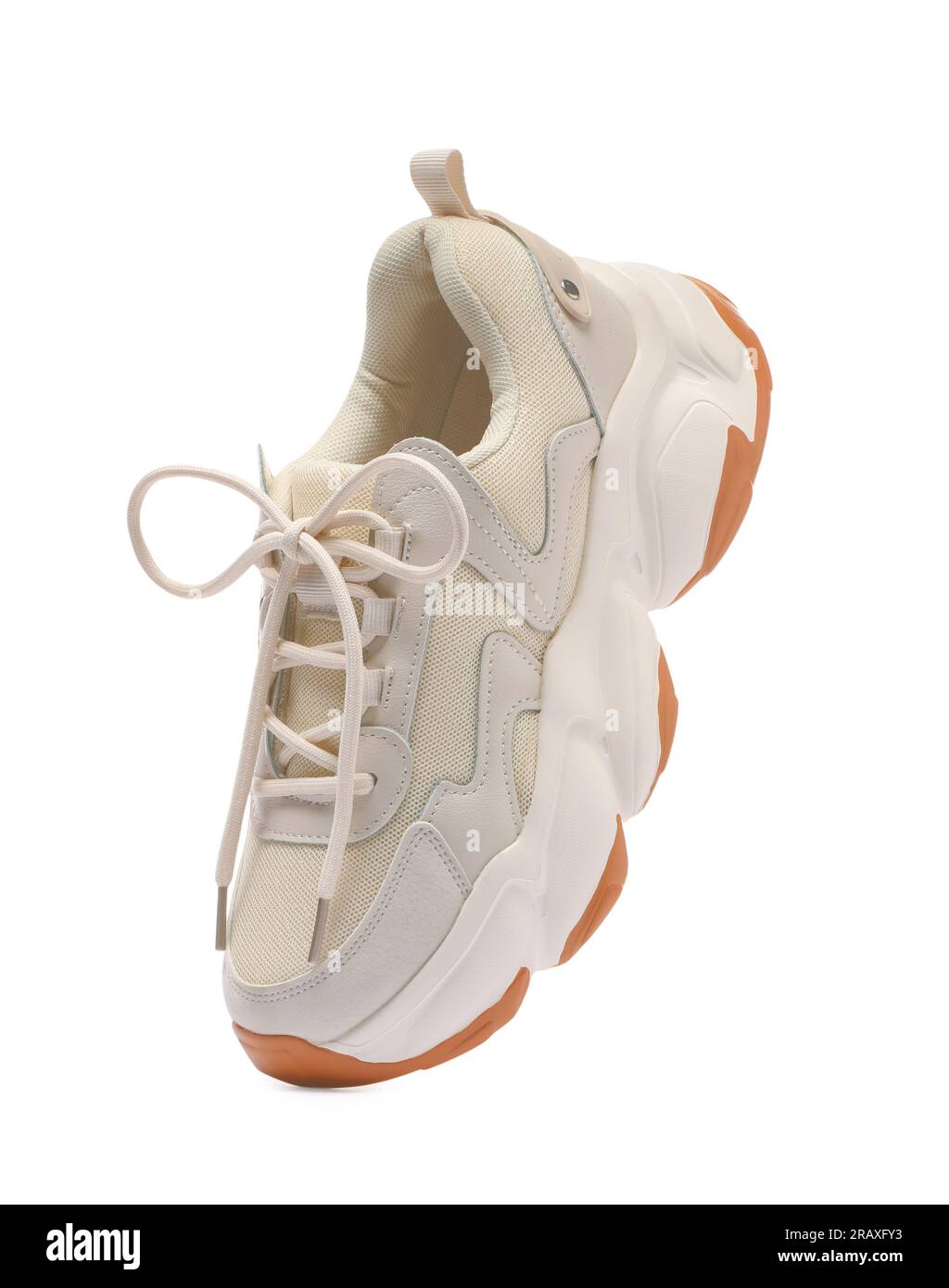 One stylish new sneaker isolated on white Stock Photo - Alamy