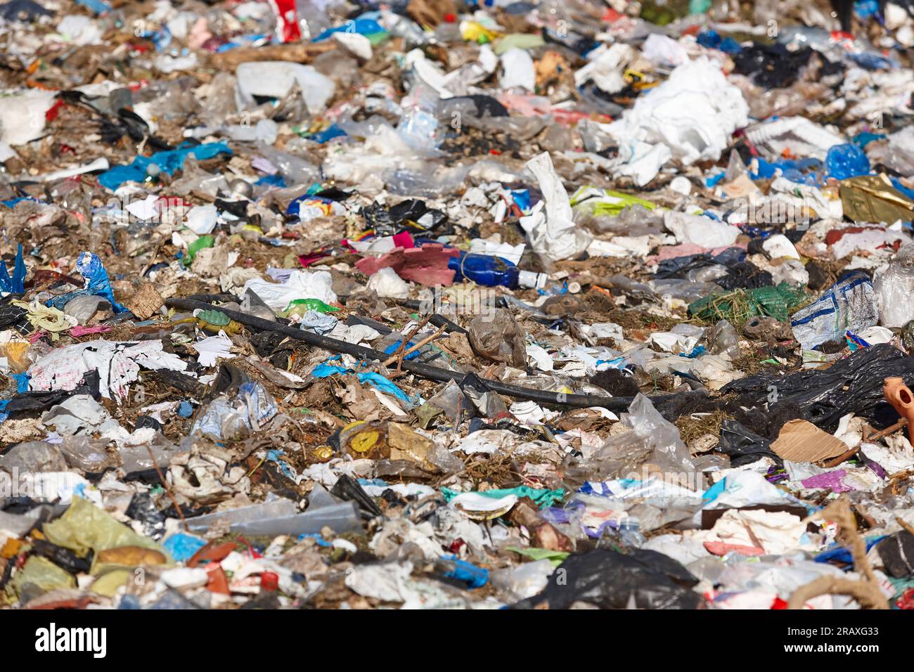 Open air garbage dump. Plastic pollution. Recycling junk. Consumerism ...