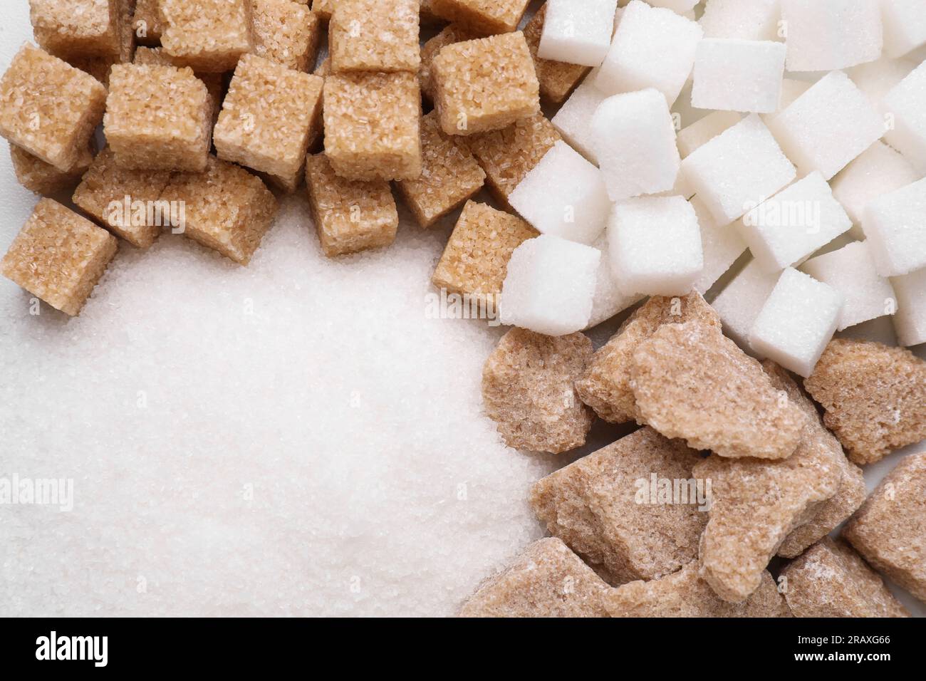 Different types of sugar as background, top view Stock Photo - Alamy