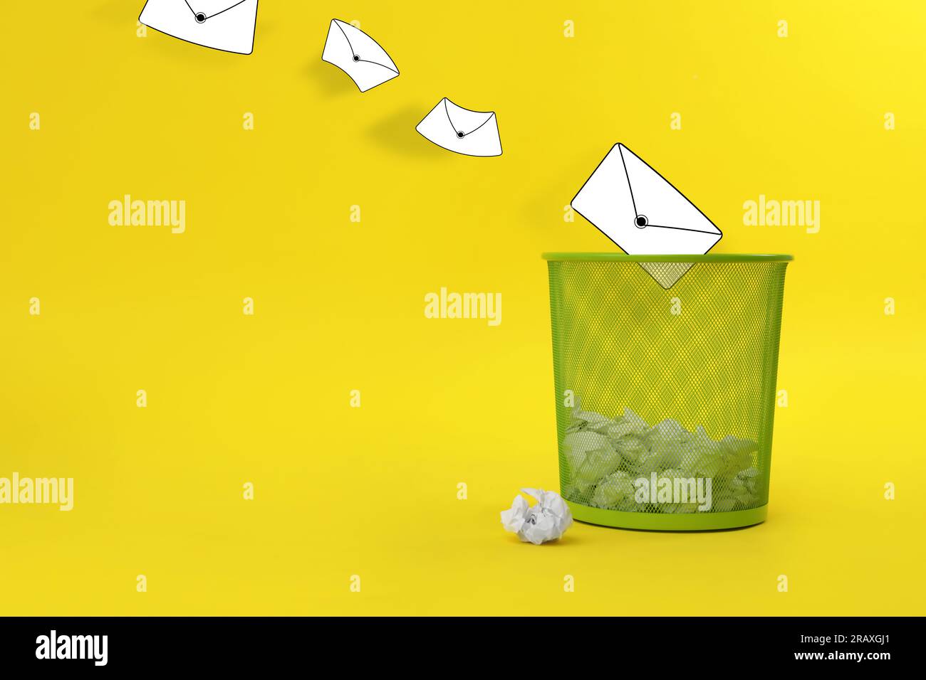 Spam. Drawn envelopes falling into bin with crumpled paper on yellow ...