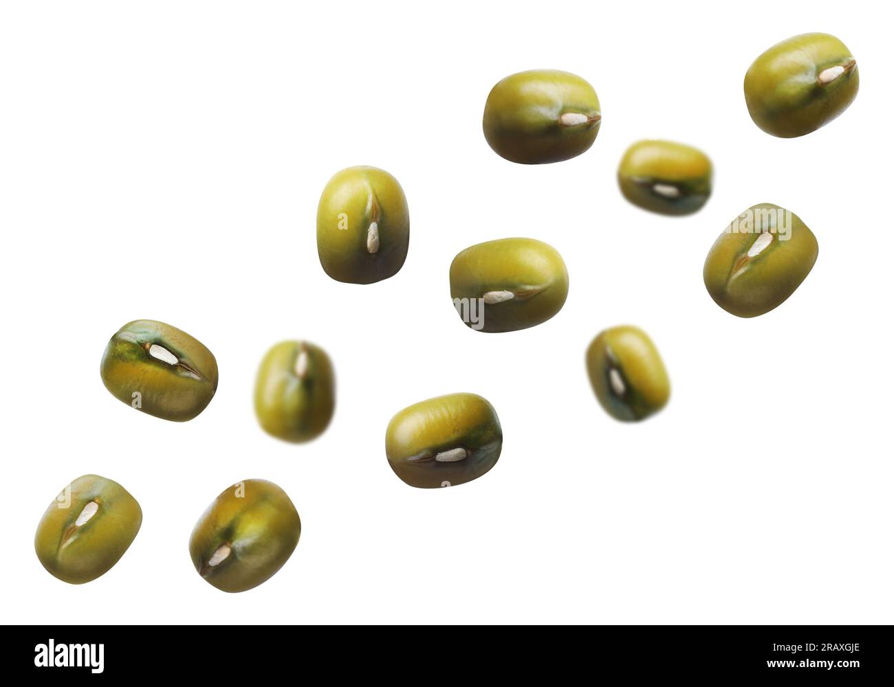 Raw mung beans falling on white background Stock Photo - Alamy