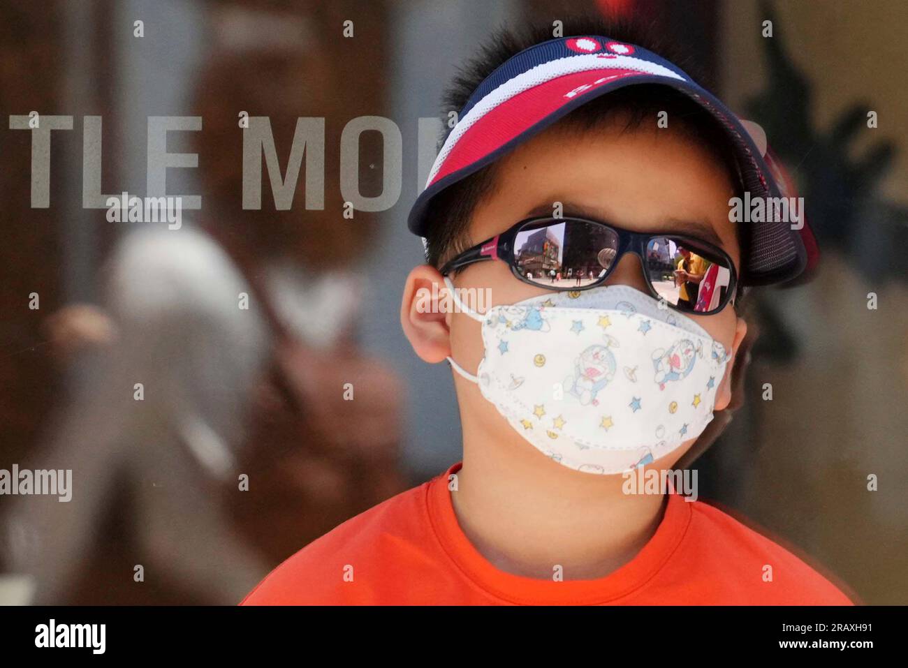 People walk in record-breaking heat wave in Beijing, China on July 6 ...
