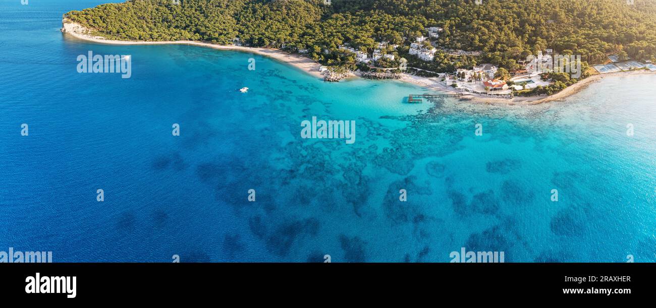 Aerial view of the paradisiacal idyllic coast with a beach and a small ...