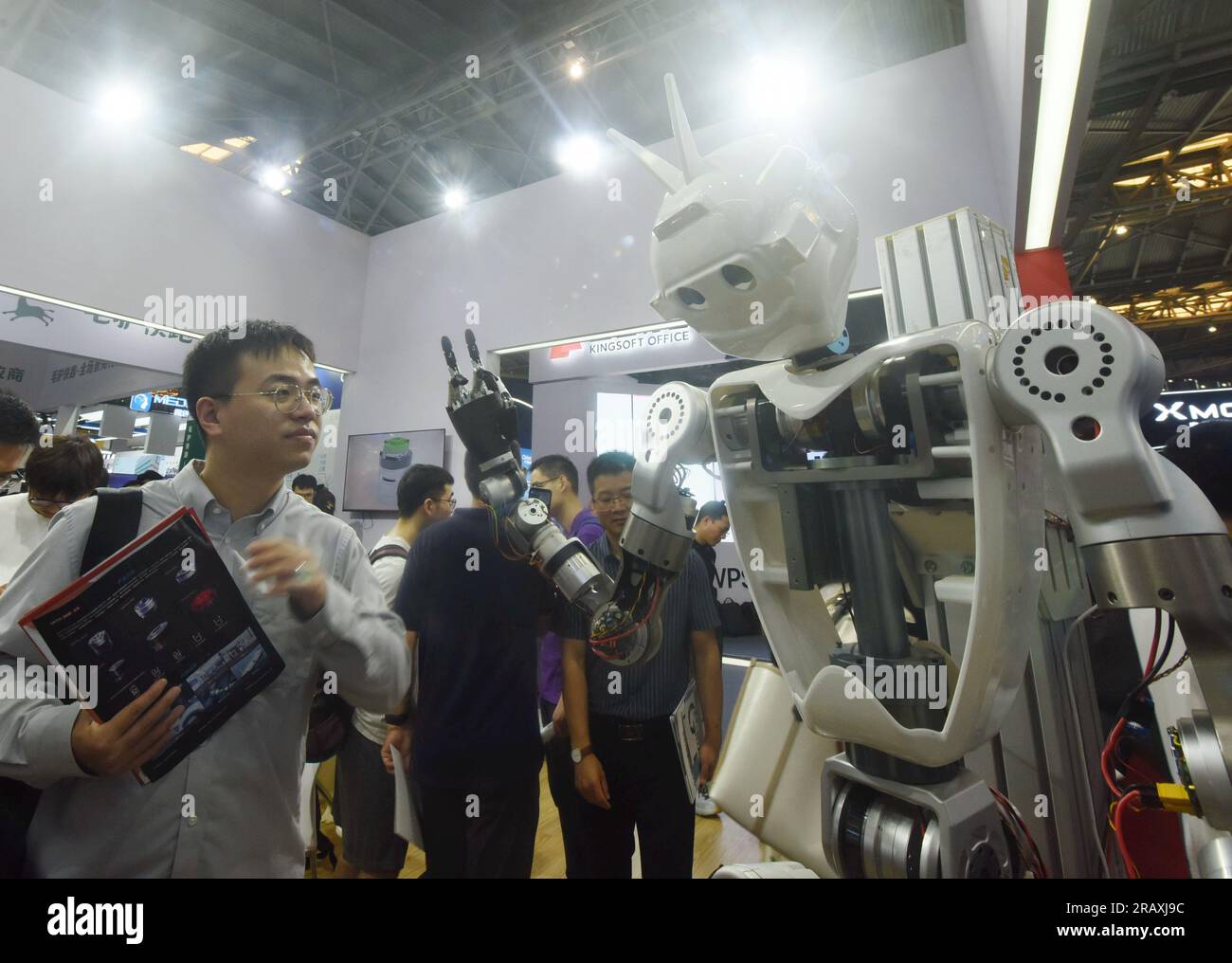 SHANGHAI, CHINA - JULY 6, 2023 - Visitors interact with intelligent ...