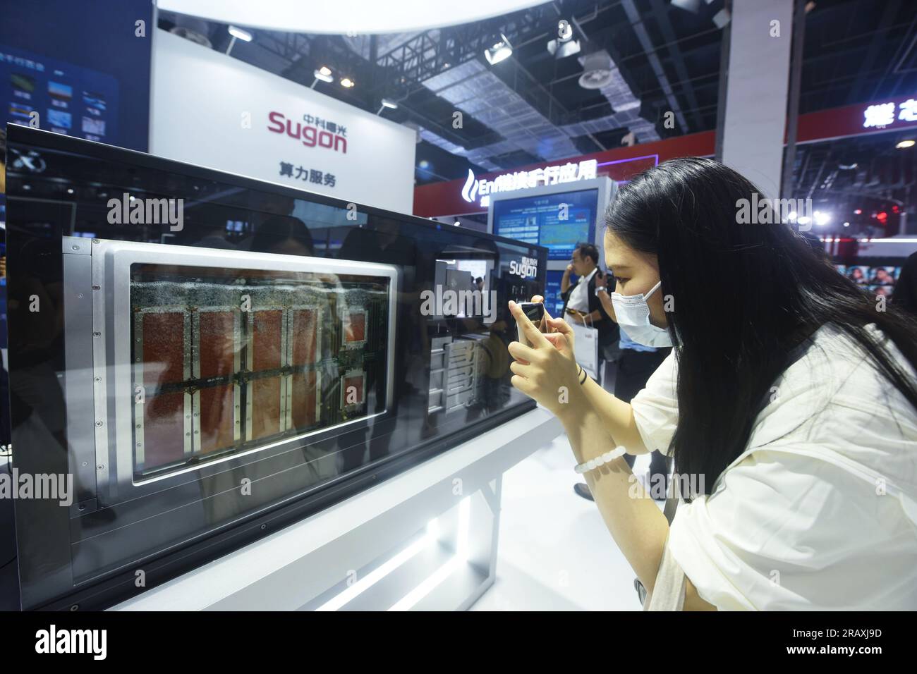 SHANGHAI, CHINA - JULY 6, 2023 - Visitors look at a liquid-cooled ...