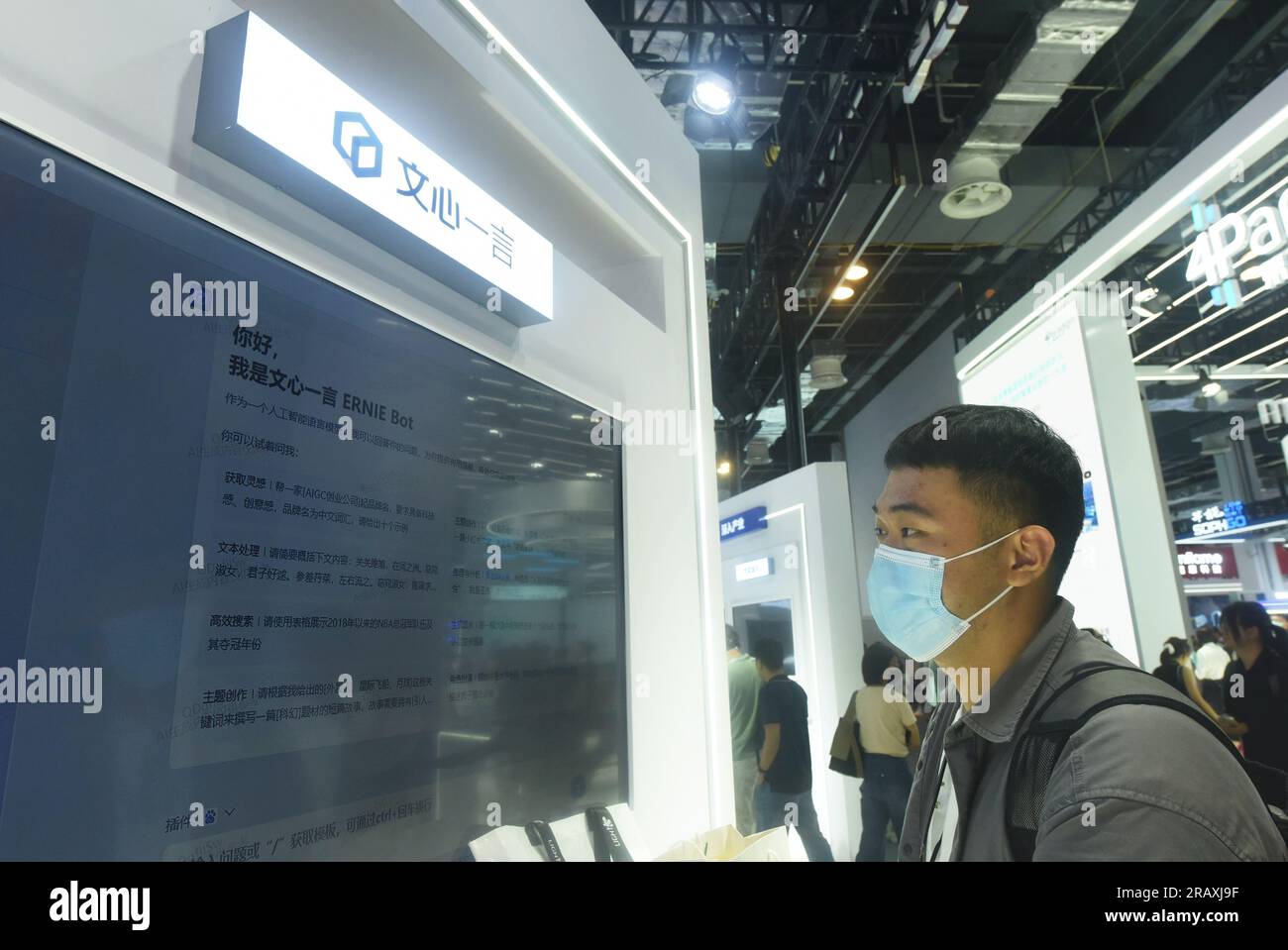 SHANGHAI, CHINA - JULY 6, 2023 - Visitors interact with Baidu's "ERNIE ...