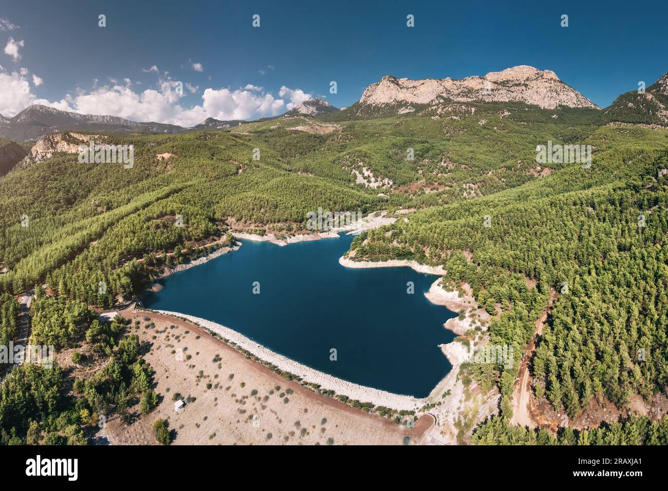 Aerial view of the reservoir pond with beautiful bluish green water ...