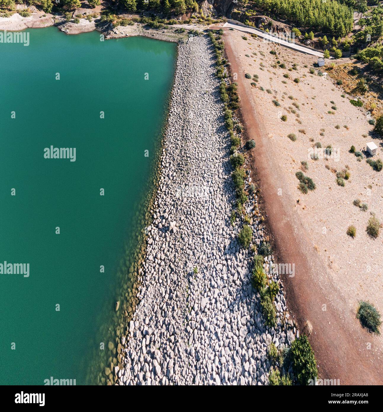 Aerial view of the reservoir pond with beautiful bluish green water ...