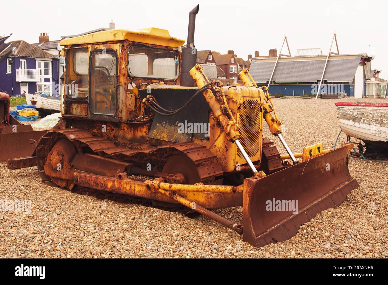 A caterpillar bulldozer on the beach at Aldeburgh, Suffolk. UK Stock ...