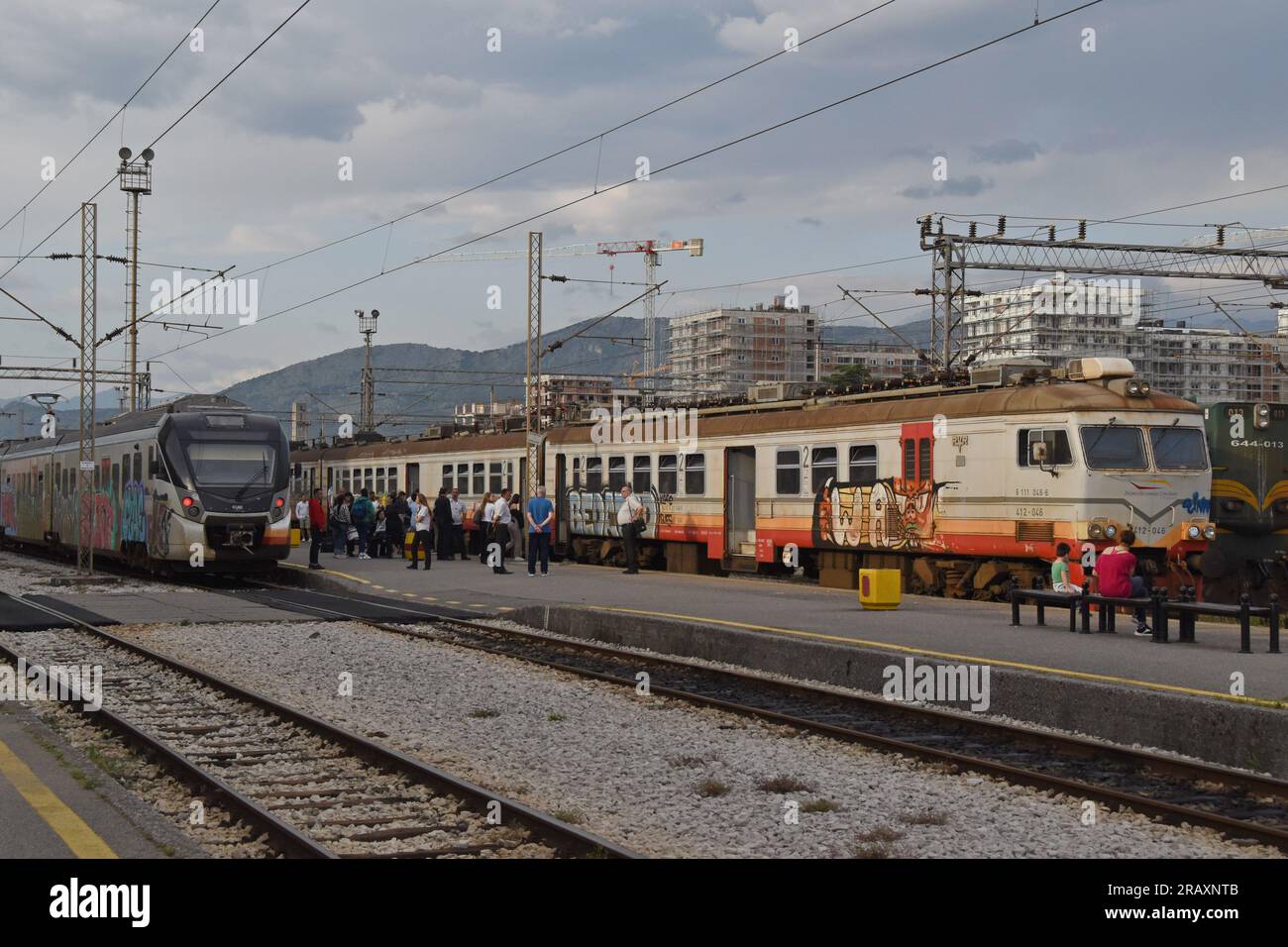 People catching trains at the main railway station, Podgorica ...