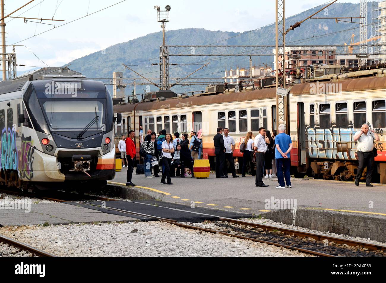 People catching trains at the main railway station, Podgorica ...