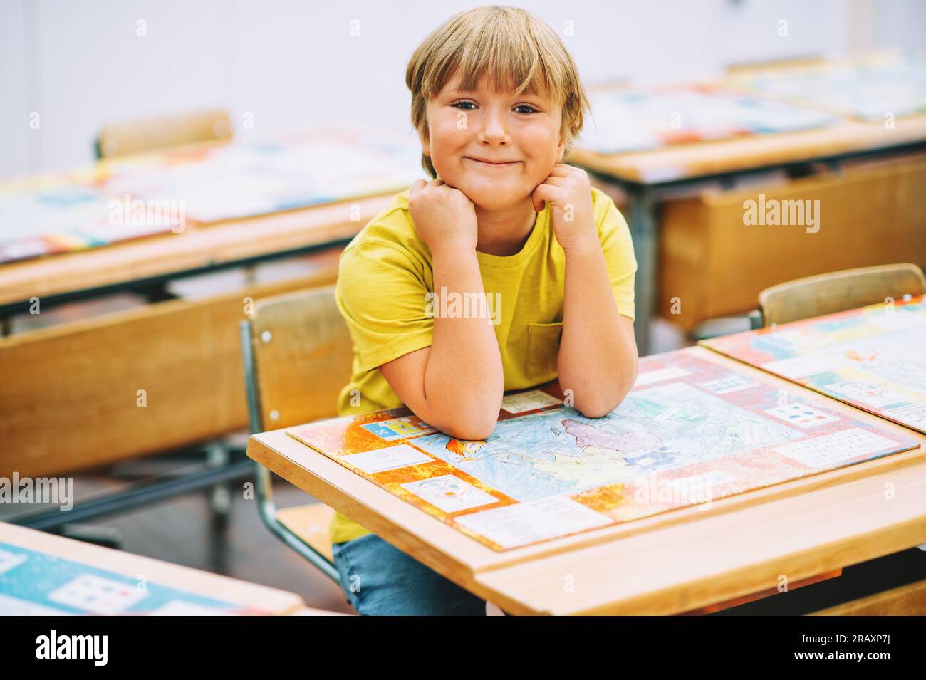 Indoor close up portrait of a cute little boy in a classroom Stock ...