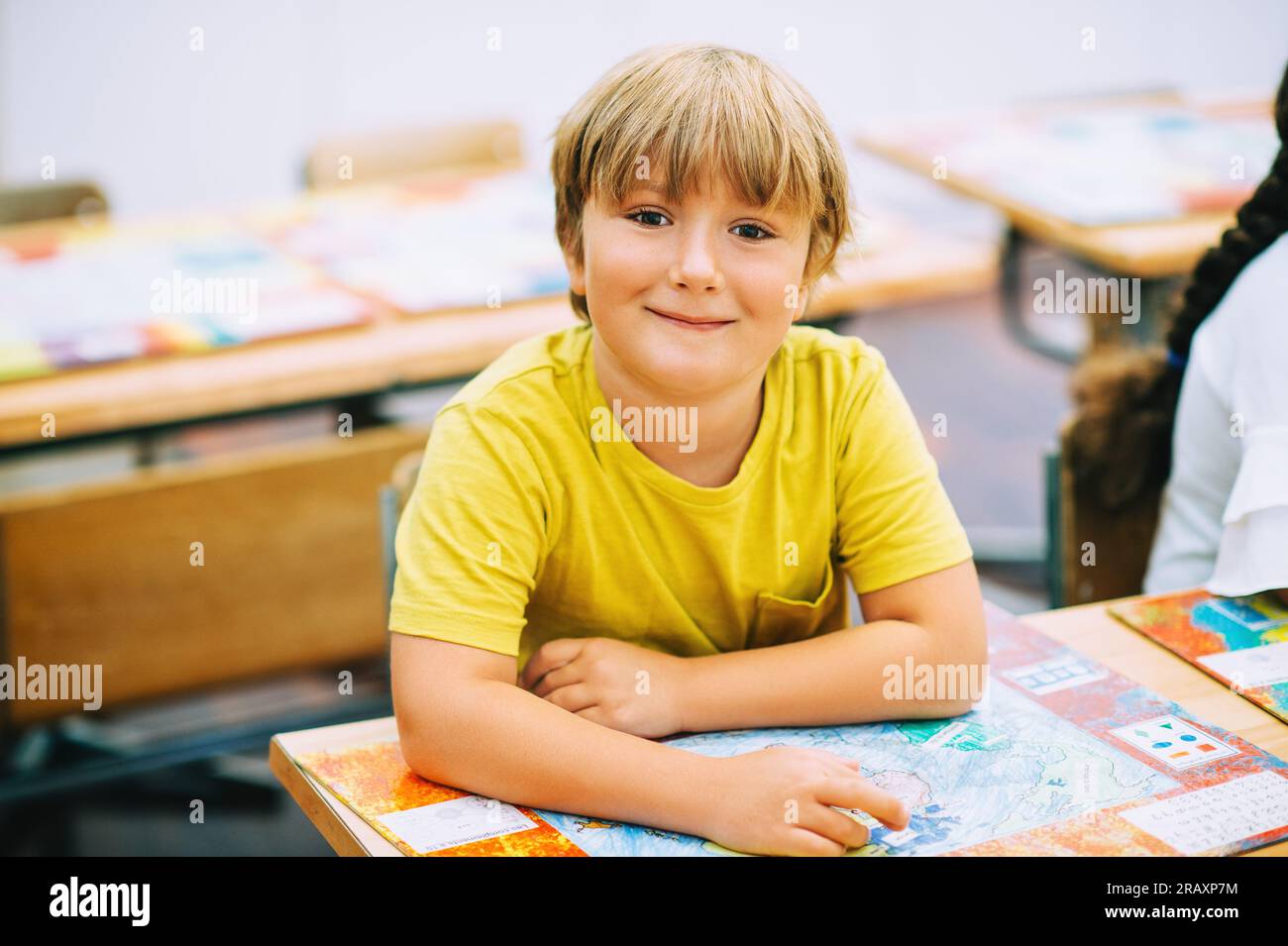 Indoor close up portrait of a cute little boy in a classroom Stock ...
