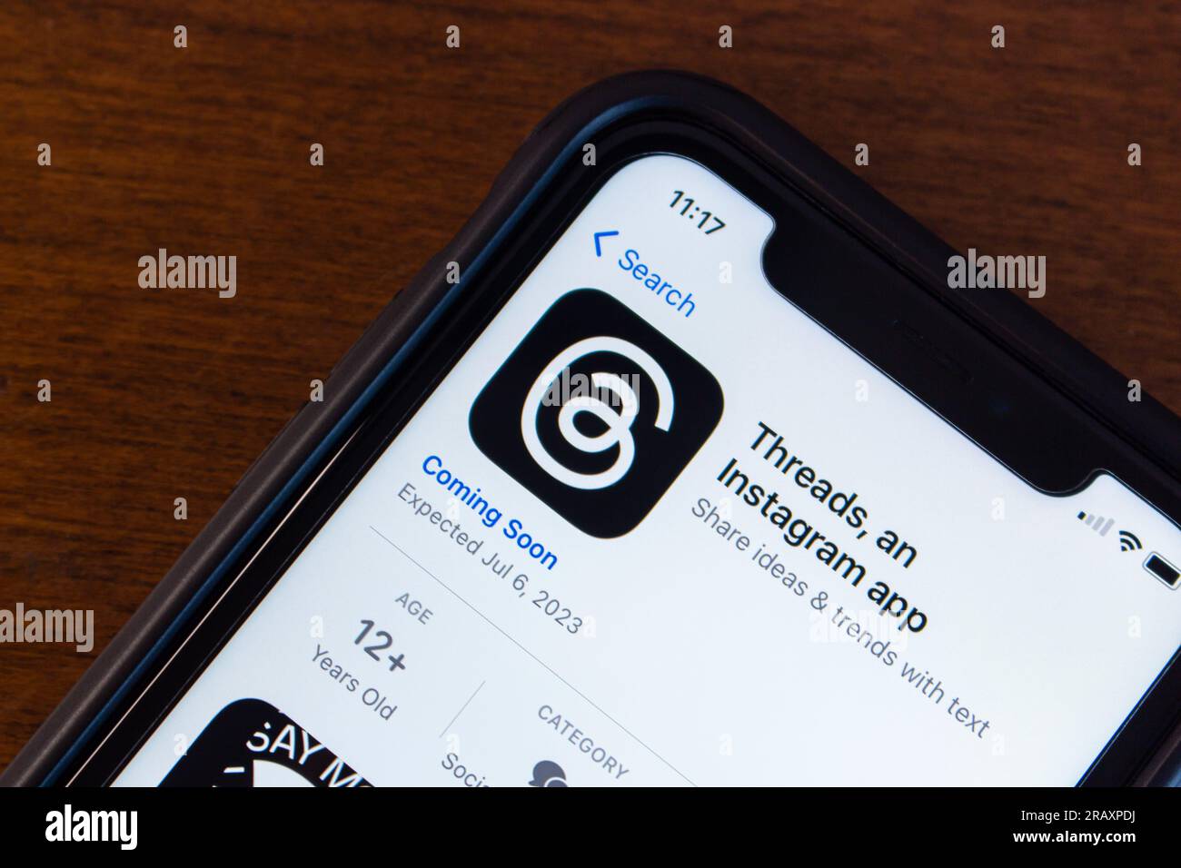 Threads app logo seen in App Store on an iPhone. Threads is an online ...