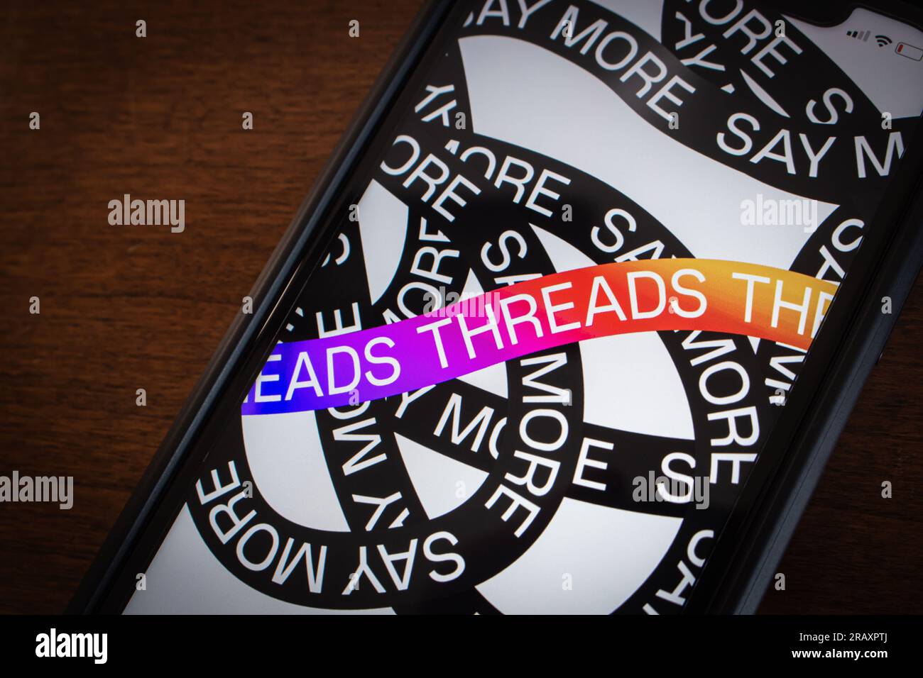 Threads app seen in an iPhone screen. Threads is an online SNS app ...