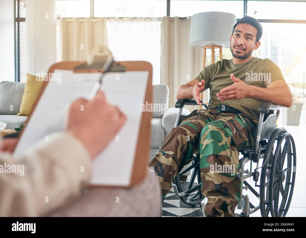 Military man, wheelchair and therapist for counselling, trauma and ...