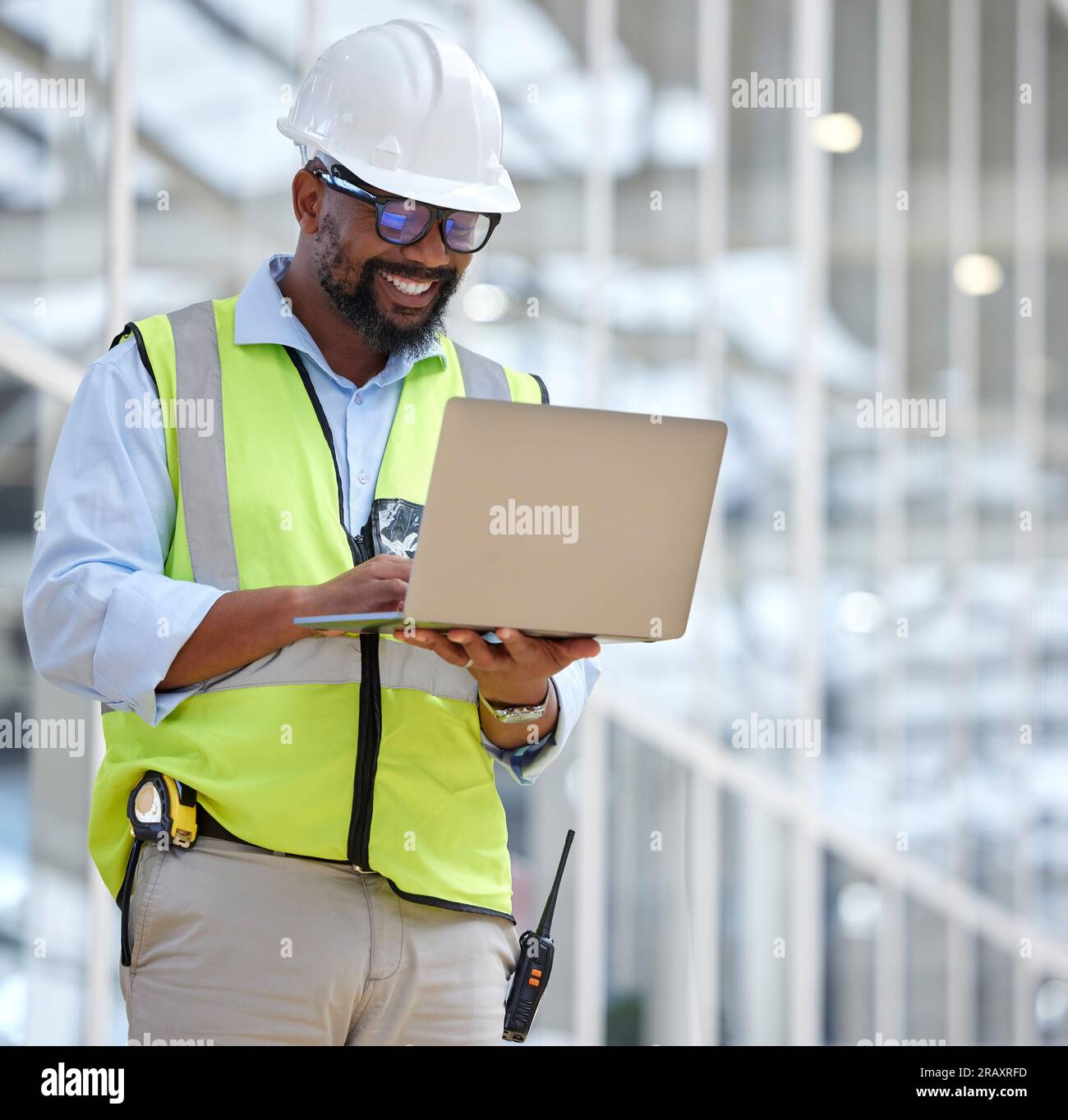 Laptop, engineering man and construction worker for online project ...